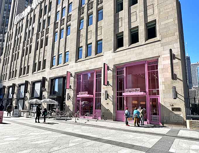 The Museum of Ice Cream's vibrant pink entrance transforms Chicago's historic Tribune Tower into a sweet escape from everyday reality.
