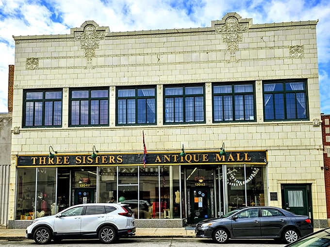 The stately facade of Three Sisters Antique Mall stands proudly on Western Avenue, its vintage charm beckoning treasure hunters from miles around.