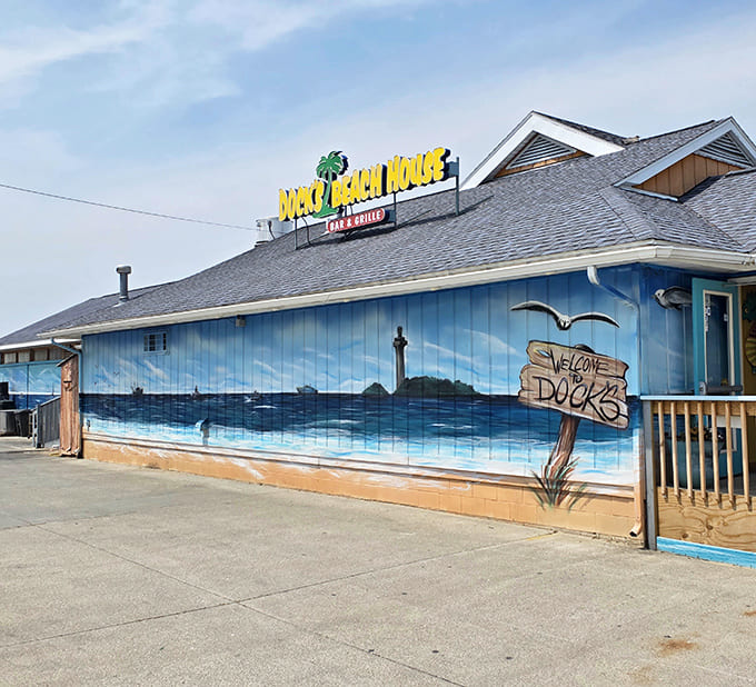 That beach mural alone is worth the drive, like someone painted a vacation directly onto the building's soul.