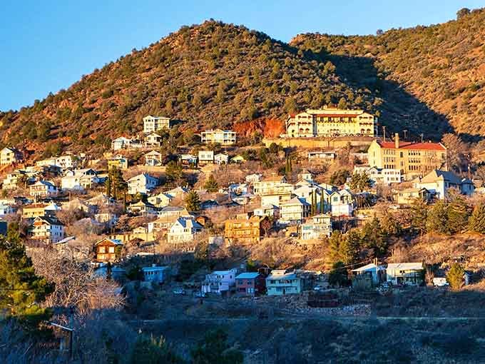 Perched on Cleopatra Hill like a town that refused to give up, Jerome cascades down the mountainside in a jumble of colorful buildings and mining-era architecture that somehow defies both gravity and expectations.