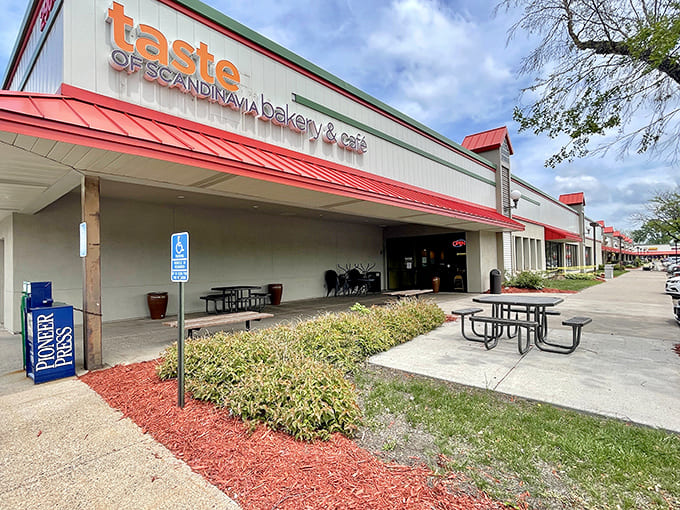 That cheerful red awning beckons like a lighthouse for carb-lovers, promising Scandinavian delights just beyond those doors.