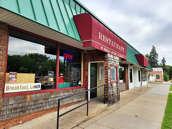 That green awning and red signage mark the entrance to Northeast Minneapolis's sweetest secret, where carbs are celebrated, not counted.