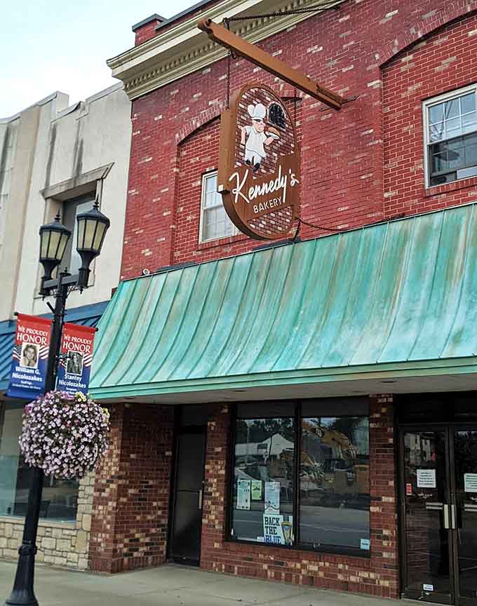 That turquoise awning and brick facade signal you've arrived at Cambridge's sweetest destination, where the pumpkin donuts are legendary and the locals know it.