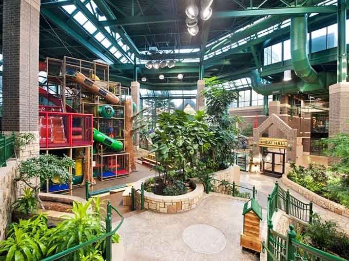 Adventure Peak towers over the indoor landscape like a playground architect's fever dream, complete with slides that actually deliver thrills.