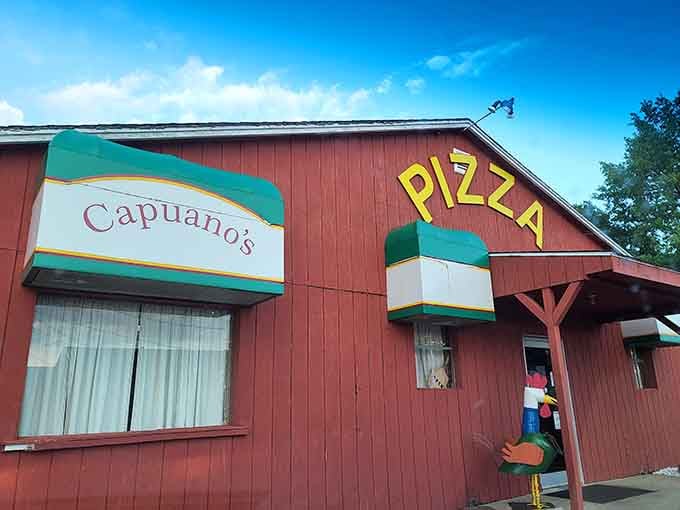 That red barn exterior isn't just charming, it's a landmark that's been guiding hungry Ohioans to pizza paradise since the late '70s.