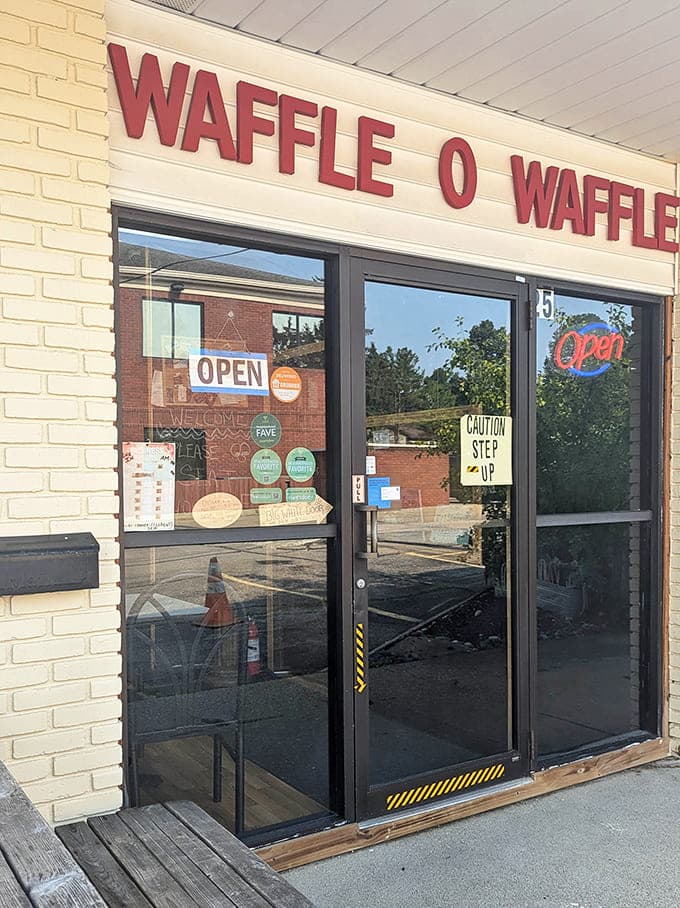 The bold red lettering of Waffle-O-Waffle beckons like a lighthouse for the breakfast-hungry, promising crispy golden goodness just beyond those doors.