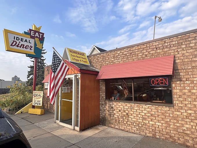 That vintage arrow sign isn't just pointing to breakfast, it's pointing to a time when diners were the heart of every neighborhood.
