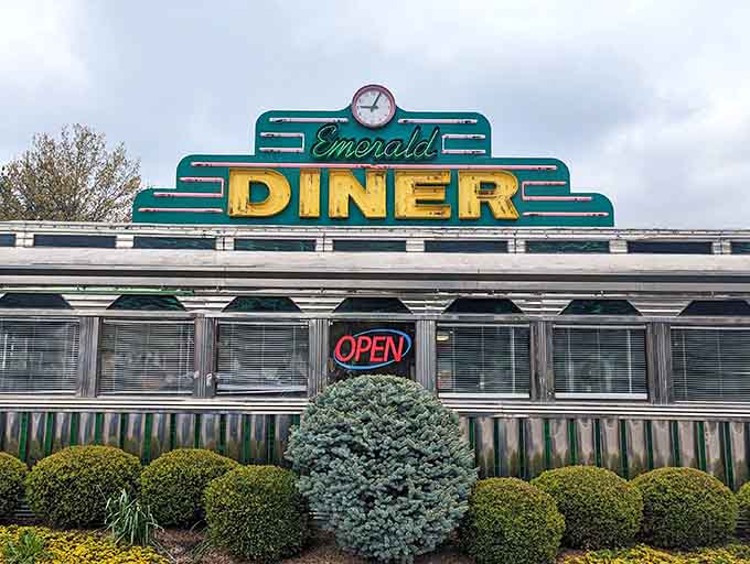 That emerald and yellow sign isn't just signage; it's a beacon calling you home to a simpler time.