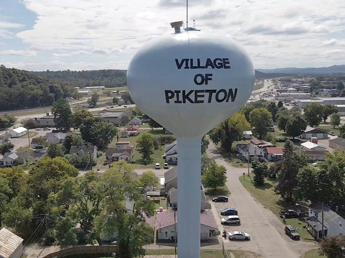 That water tower isn't just infrastructure, it's a declaration of pride visible for miles around the village.