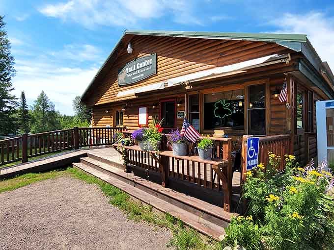 The rustic charm of this log cabin exterior promises the kind of authentic northwoods experience your soul's been craving.