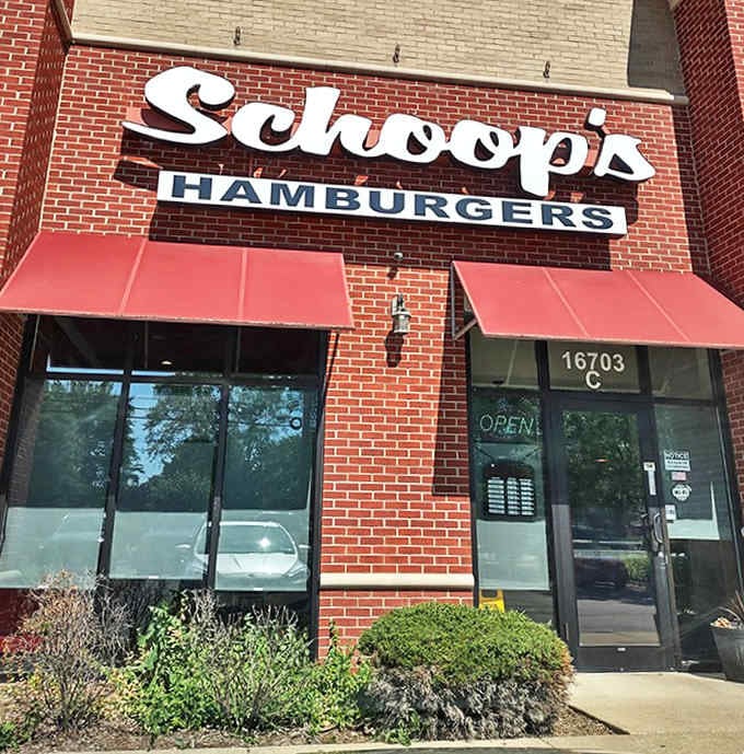 That classic brick facade and cheerful red awning hide some of the most crave-worthy comfort food in Illinois, no fancy signage needed.