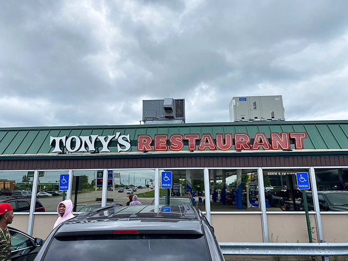 Tony's Restaurant stands proudly along I-75, its iconic green roof and bold signage a beacon for hungry travelers seeking legendary portions.
