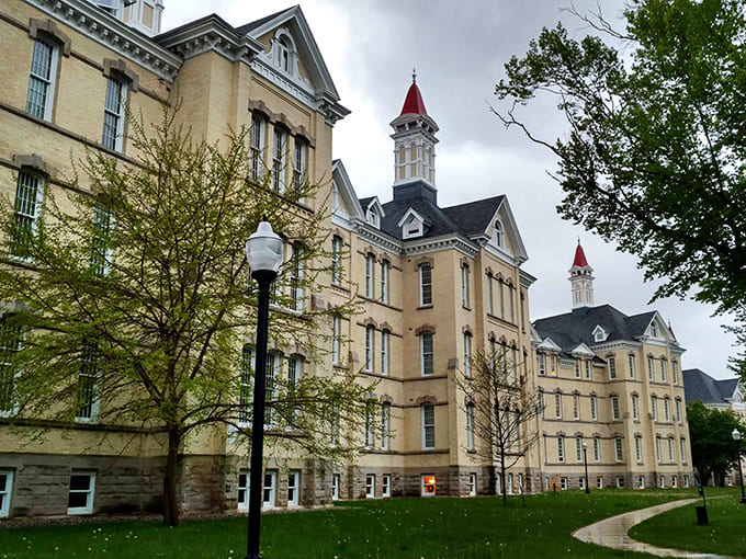 The majestic yellow-brick fa&ccedil;ade of Traverse City State Hospital stands as a testament to an era when architectural beauty was considered therapeutic medicine.