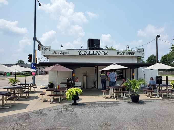 The classic drive-in facade of Wally's beckons hungry travelers with its timeless charm and promise of seriously good burgers.