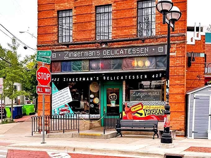 The iconic brick facade of Zingerman's Delicatessen stands proudly at Detroit and Kingsley, a beacon for sandwich pilgrims seeking transcendent flavors in Ann Arbor.