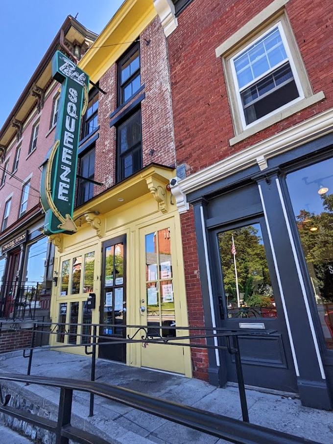 Step right up to the cheesiest show in town! Park Squeeze's neon sign beckons like a beacon of comfort food bliss.