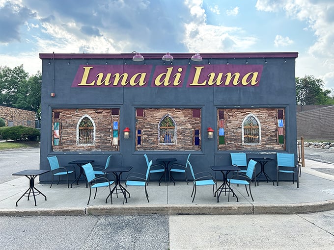 Luna di Luna's charming exterior beckons pasta lovers with its stone accents and inviting blue tables &ndash; a little slice of Italy in Minnesota.