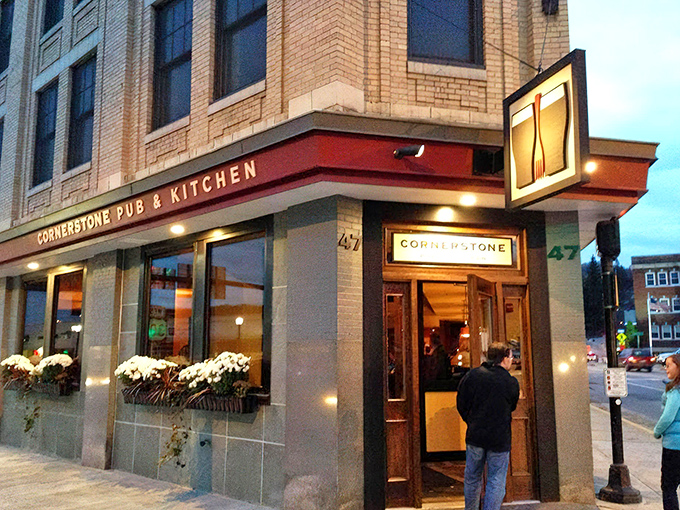 Cornerstone's inviting exterior beckons from the corner of North Main Street, its warm glow promising culinary delights within.
