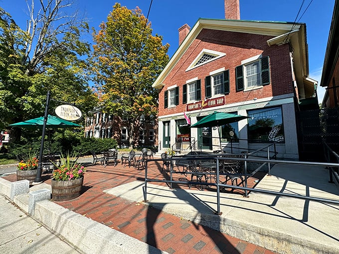 Thompson's Flour Shop stands proudly in Morrisville, its classic brick exterior and inviting patio promising culinary treasures within. The autumn leaves add nature's perfect garnish.