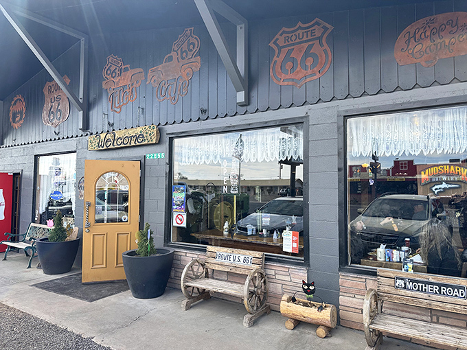 The unassuming exterior of Lilo's Cafe beckons travelers with Route 66 shields and a promise of authentic roadside dining that delivers far beyond its modest appearance.