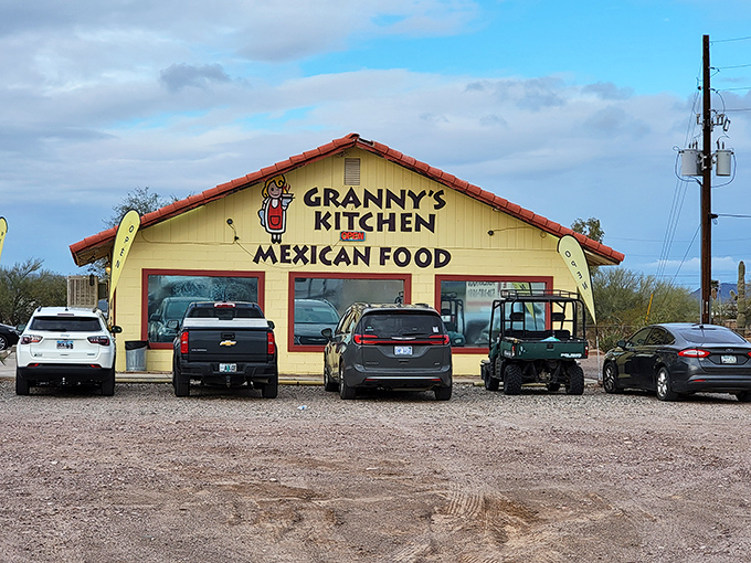 The cheerful yellow exterior of Granny's Kitchen beckons hungry travelers with its simple charm and promise of authentic Mexican cuisine.