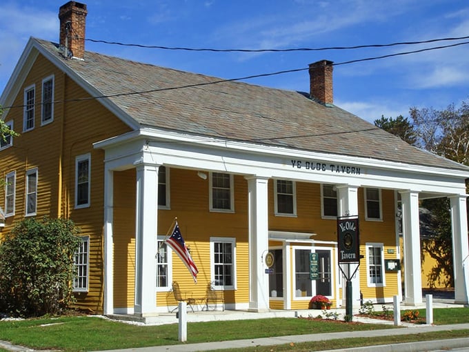 A splash of sunshine in architectural form, Ye Olde Tavern's mustard-yellow Colonial exterior stands proudly against the Vermont sky, welcoming hungry travelers since 1790.
