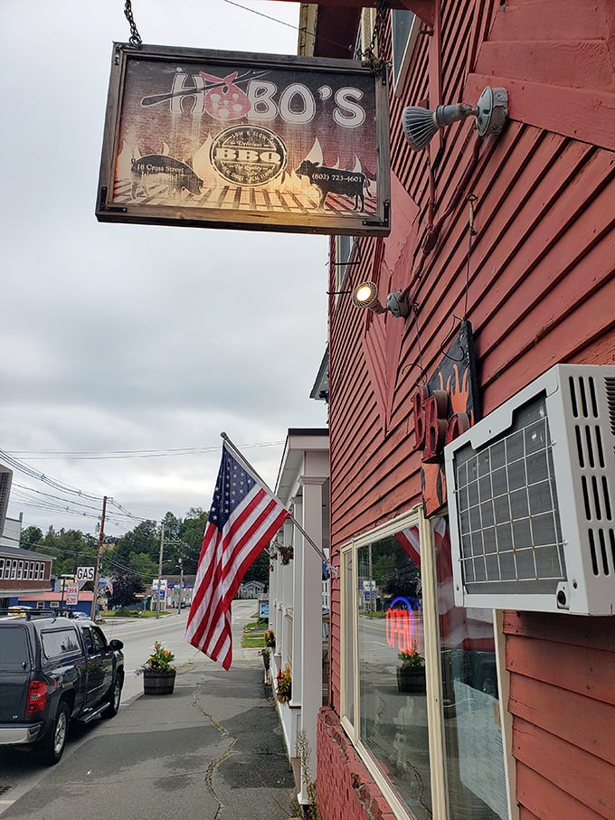 The weathered sign hanging from Hobo's bright red exterior promises authentic Vermont charm and home-cooked goodness within.