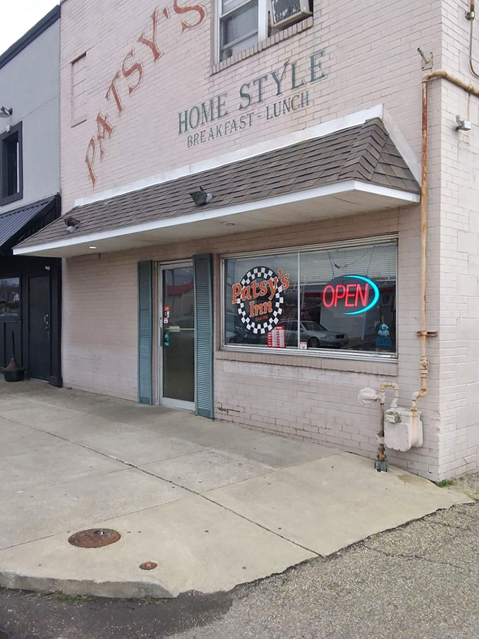 Welcome to Patsy's Inn, where the neon "OPEN" sign might as well say "Come on in, we've got biscuits!"