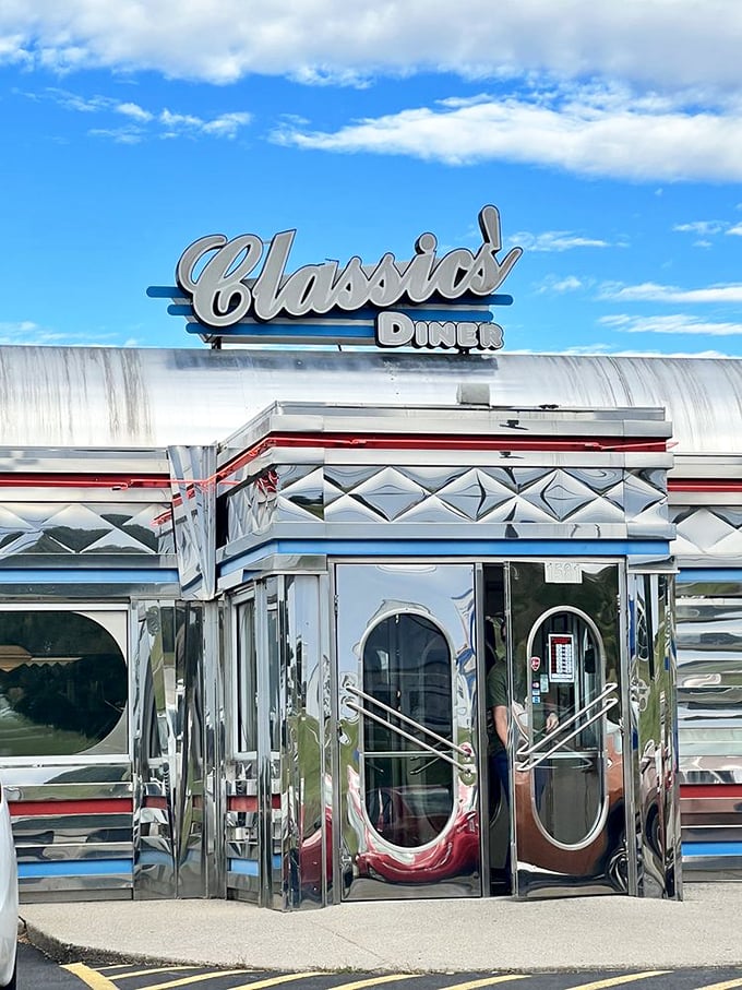 Step into a time machine disguised as a diner! This gleaming chrome facade isn't just eye-catching&mdash;it's a portal to the golden age of rock 'n' roll and comfort food.