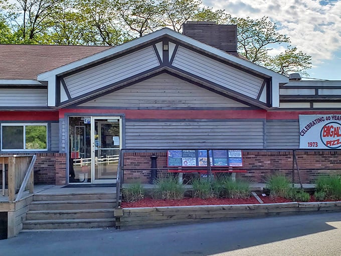 The unassuming exterior of Big Al's Pizza hides a world of culinary delights within its walls, proving great food doesn't need fancy packaging.