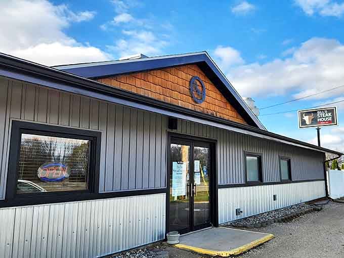 Bill's Steakhouse exterior beckons with rustic charm and the promise of culinary treasures hiding behind that unassuming metal siding.