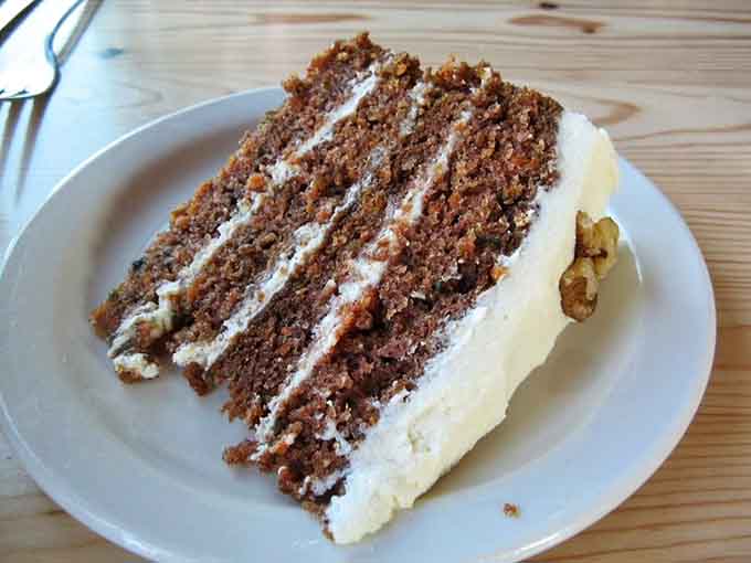 Carrot cake with layers of cream cheese frosting so generous, you might need a forklift and zero regrets.