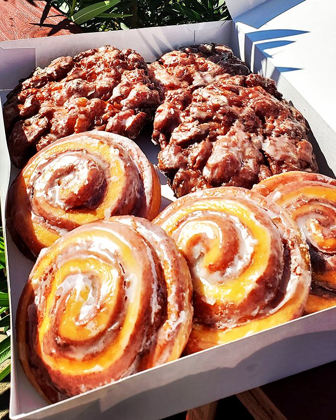 Cinnamon-scented heaven on a plate. These fritters and buns aren't just breakfast&mdash;they're a warm, gooey hug for your taste buds.
