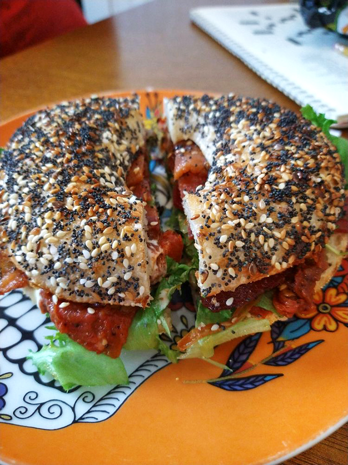 Crisp bacon, fresh greens, and juicy tomato find their perfect match in the subtle smokiness of Rover's wood-fired everything bagel.