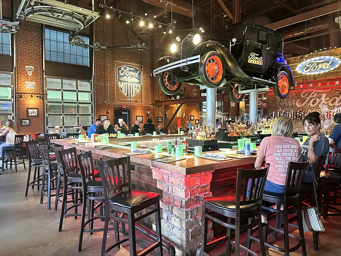 The bar area isn't just where drinks are served &ndash; it's a museum where vintage Ford memorabilia meets craft beer in perfect harmony.