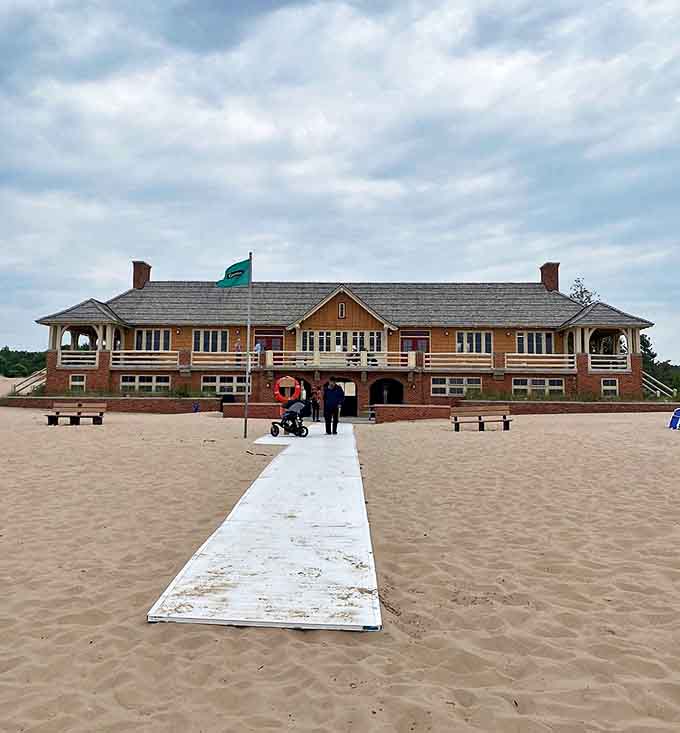 This charming lakeside structure serves as both a practical amenity hub and architectural nod to Michigan's resort heritage.