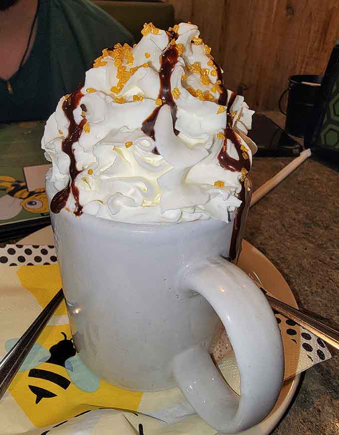 That towering hot chocolate situation looks like it could double as a dessert, a beverage, and possibly a small mountain all at once.