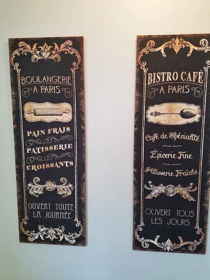 French-inspired wall art adds unexpected charm to this thoroughly American deli, creating an atmosphere that's both worldly and wonderfully local.