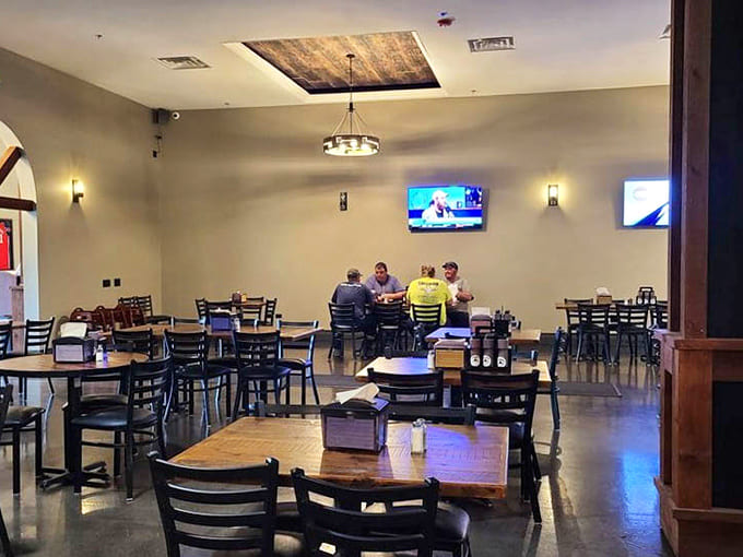 Another angle on the dining area reveals the kind of straightforward setup that says "we spent our budget on the smoker, not the chandelier," and that's exactly right.