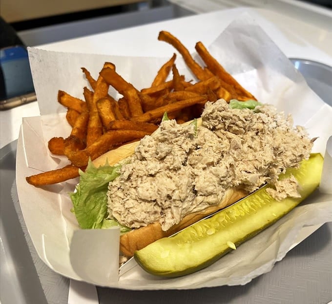 Sometimes the best meals are the simplest: fresh tuna salad, crispy fries, and a pickle that never stood a chance.
