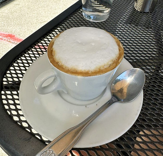 That cappuccino foam is so perfect, it almost seems criminal to disturb it, almost being the key word.