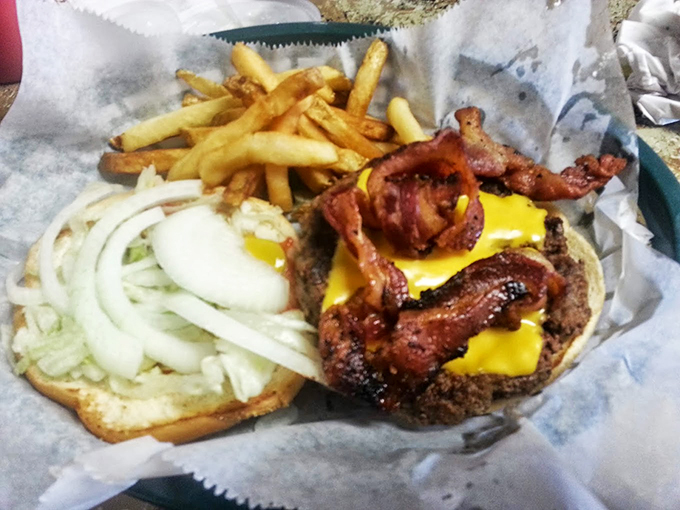 Burger bliss! Juicy patty, crispy fries – a classic combo that never goes out of style at CP Deli.