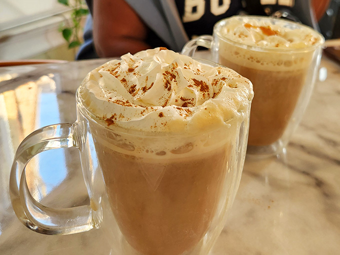 Coffee topped with whipped cream and a sprinkle of cinnamon is basically a hug in a mug.