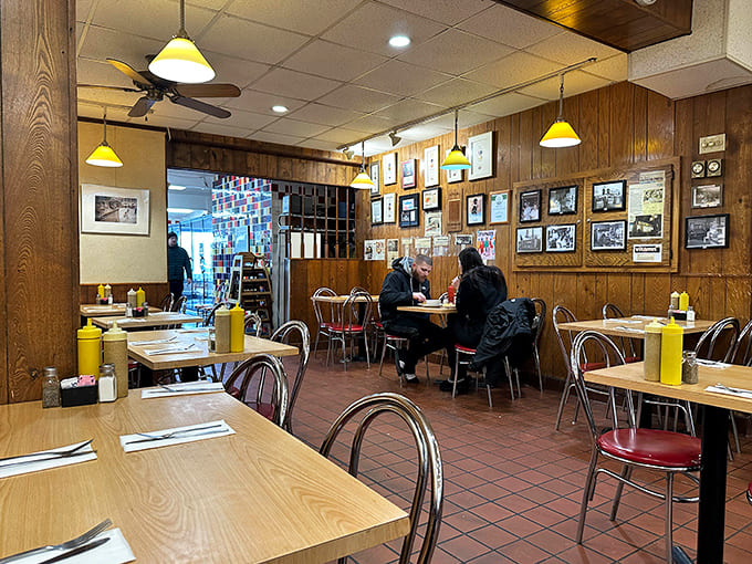 The dining area is simple and welcoming, with vintage photos and a vibe that makes you want to linger.