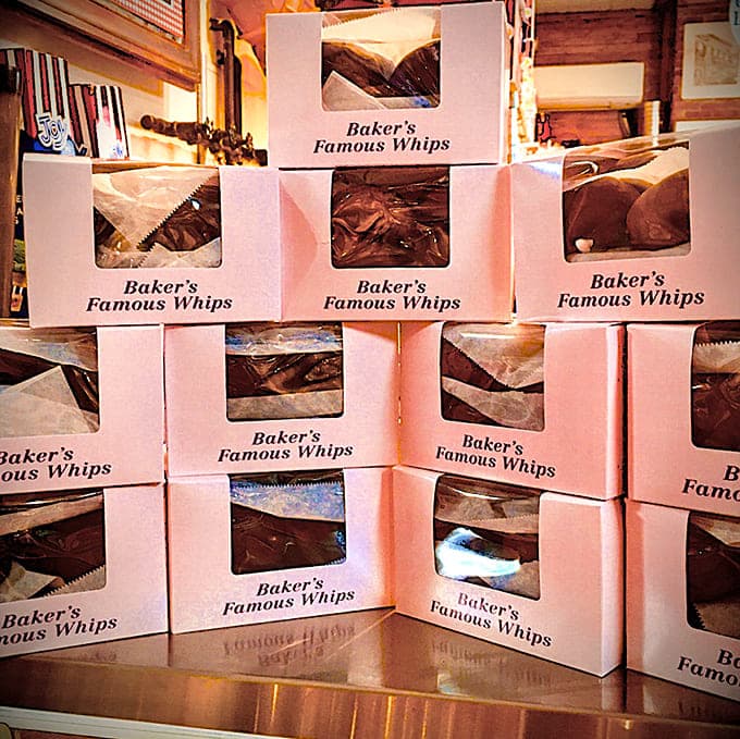 Baker's Famous Whips are chocolate-covered marshmallow clouds that make you understand why people write love letters to desserts.