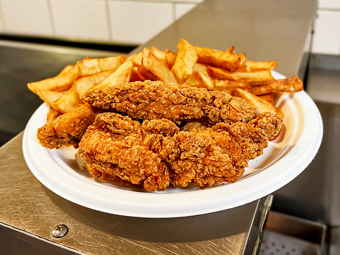 Chicken strips fried to golden perfection alongside proper chips &ndash; proving that British cuisine extends well beyond the fish that usually steals the spotlight.