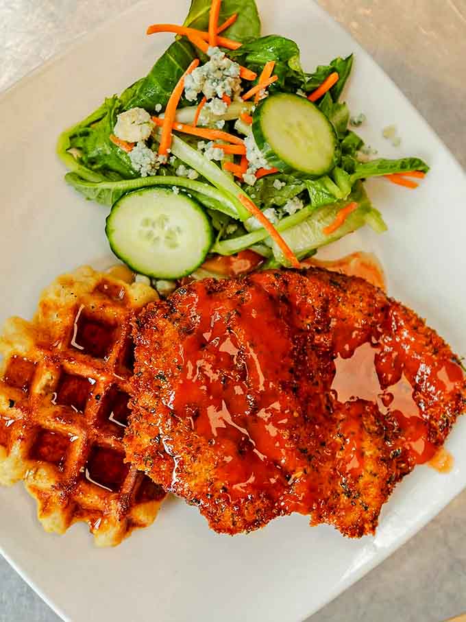 Chicken and waffles: the unlikely couple that proves opposites really do attract, especially when drizzled with hot honey.