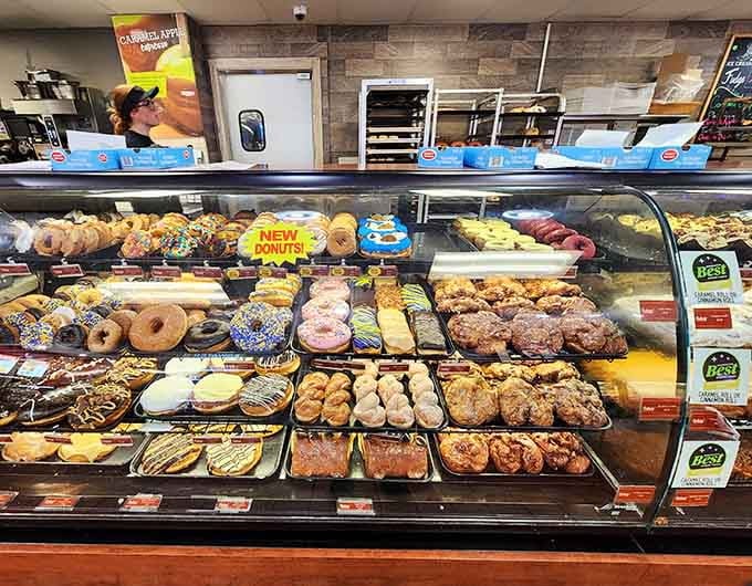 The donut case looks like a sugary treasure chest, and yes, you should absolutely get one of everything.