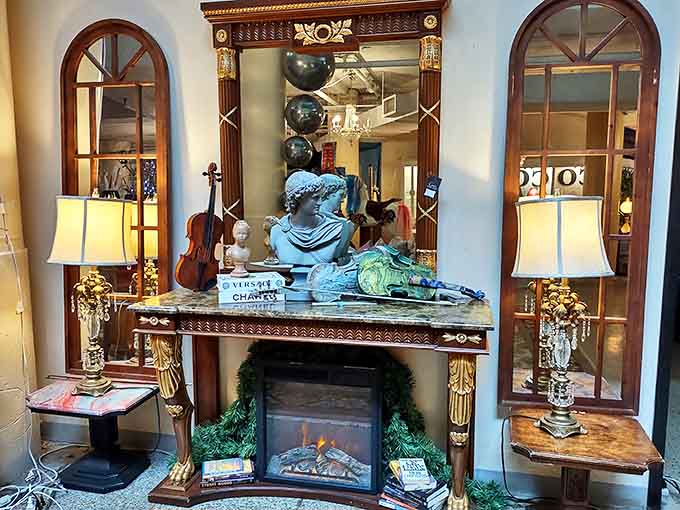 Timeless elegance captured in this vignette &ndash; ornate mirror, classical bust, and perfect symmetry create a magazine-worthy backdrop.