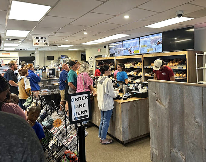 The morning rush at Congdon's is real, with locals and tourists alike queuing up for their fried dough fix.